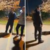 A police officer giving advice to a young man suffering from heartbreak ...